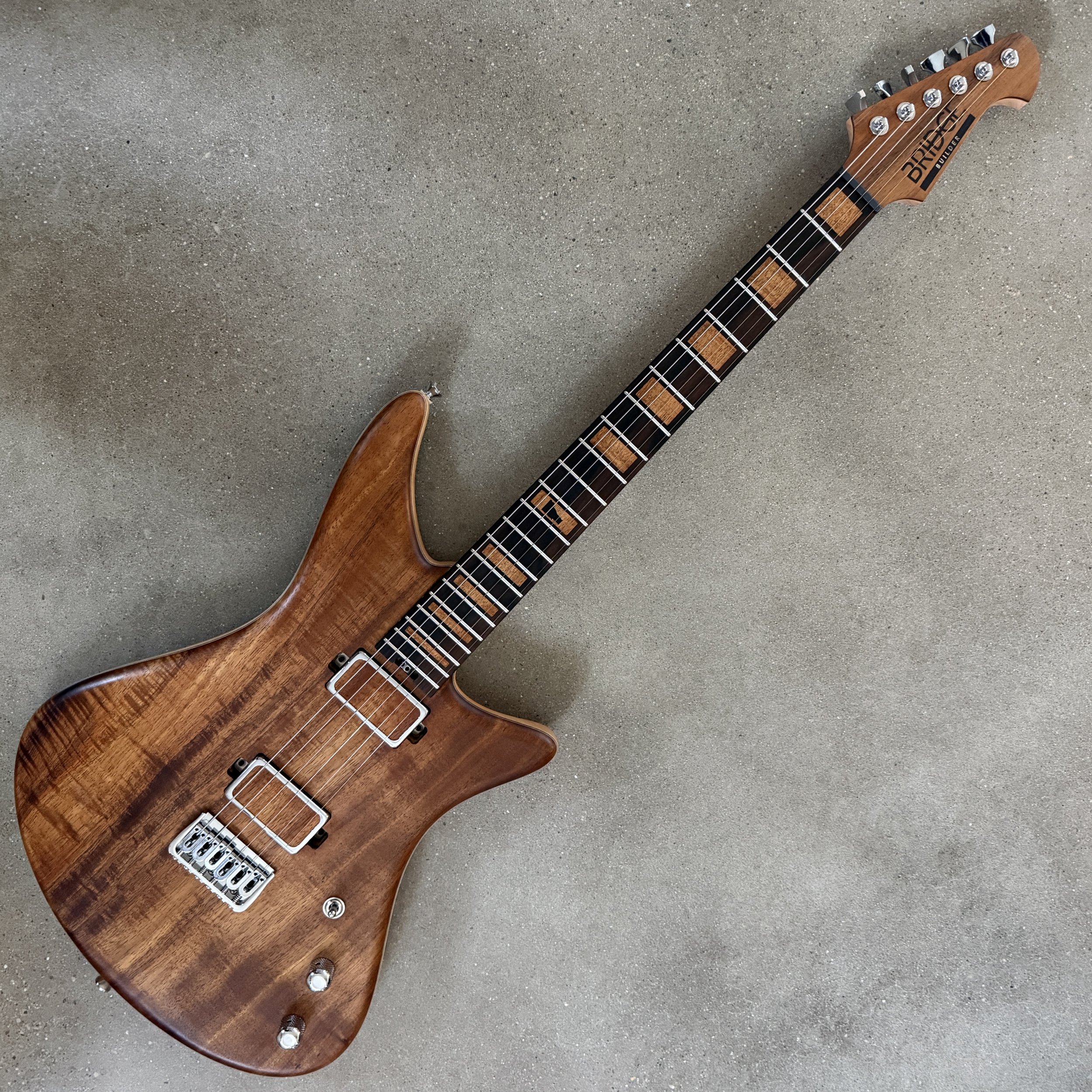 1-piece figured Koa drop top Hornet — Justin Kennedy