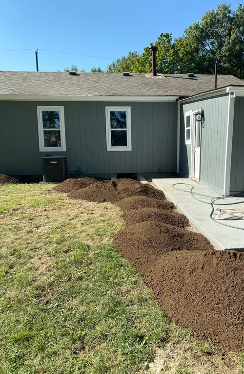 Backfilling Around Concrete With Topsoil — American Topsoil