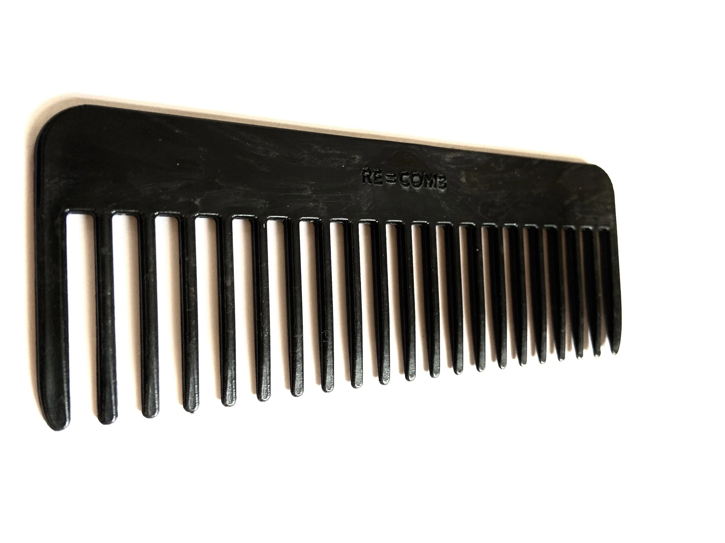 Hair combs made from recycled plastic — Re=Comb