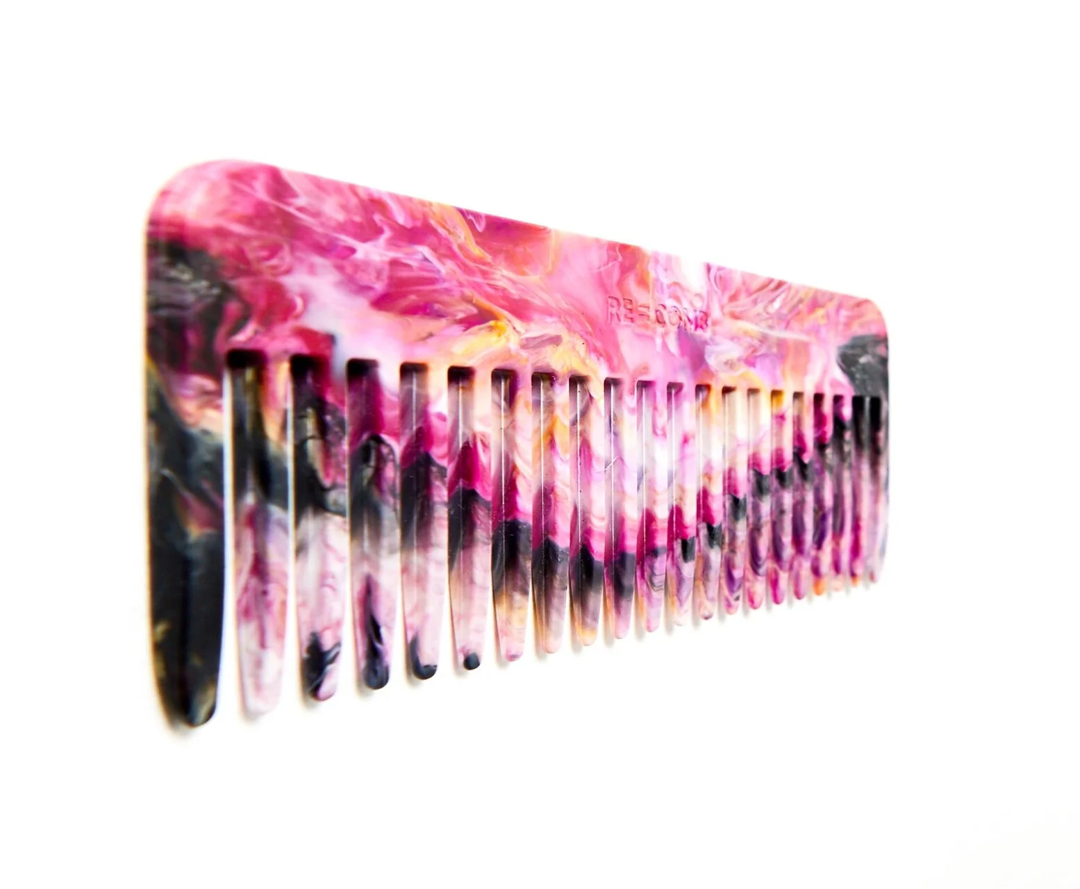Hair combs made from recycled plastic — Re=Comb