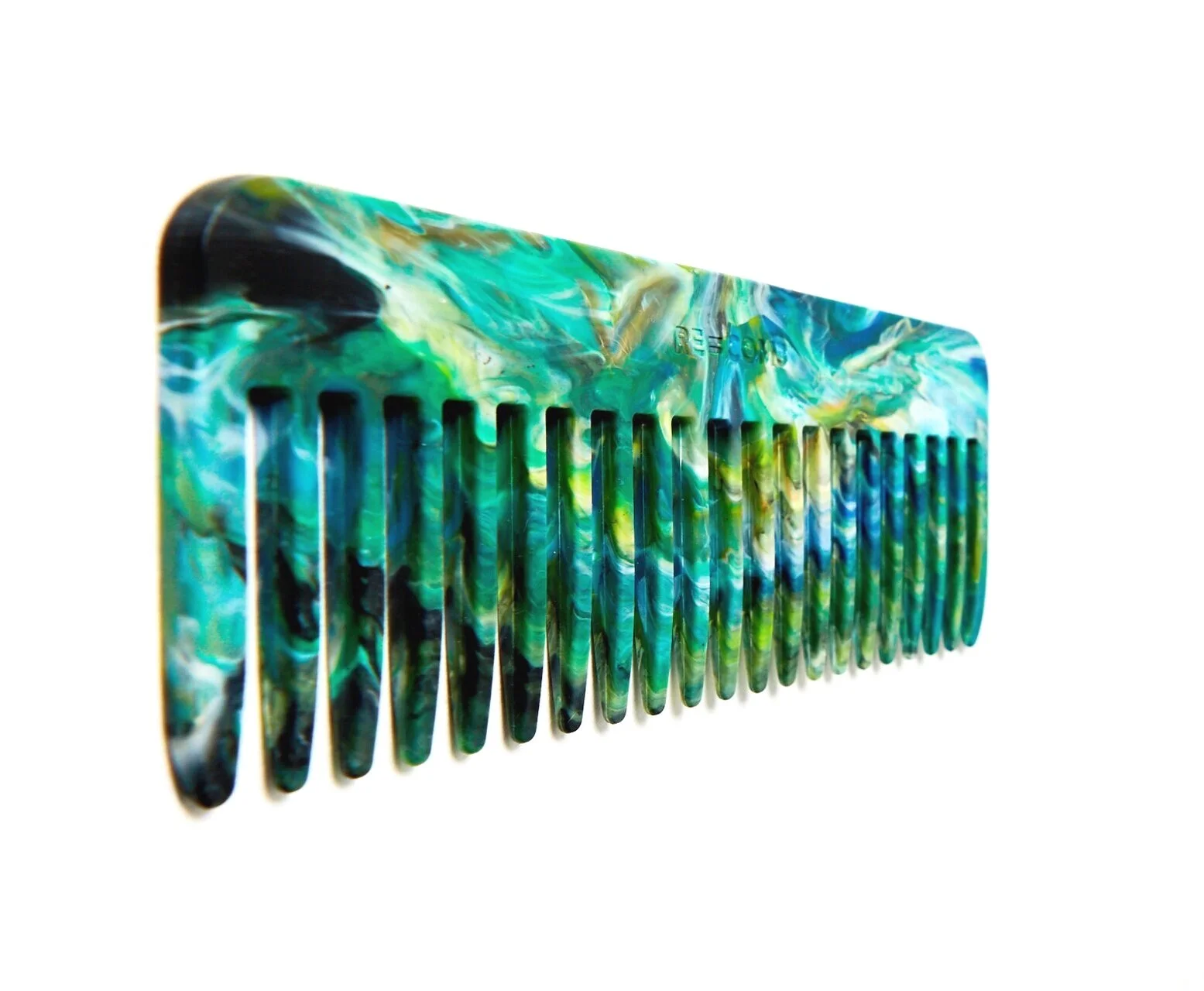 Hair combs made from recycled plastic — Re=Comb