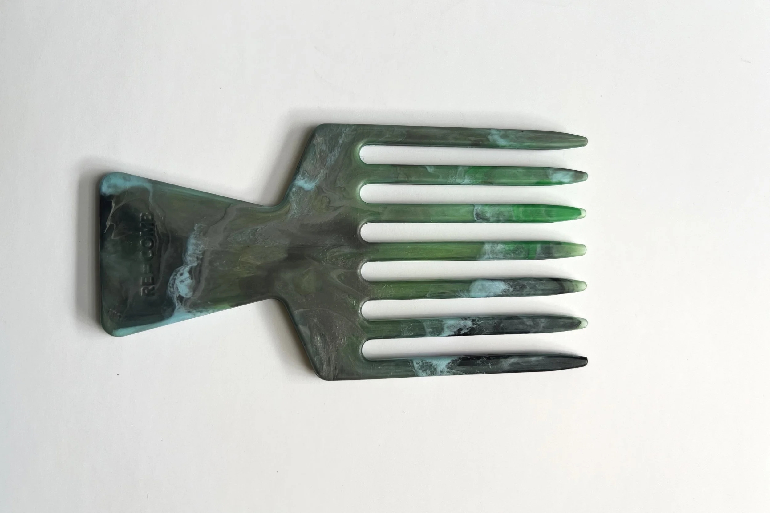 Hair combs made from recycled plastic — Re=Comb