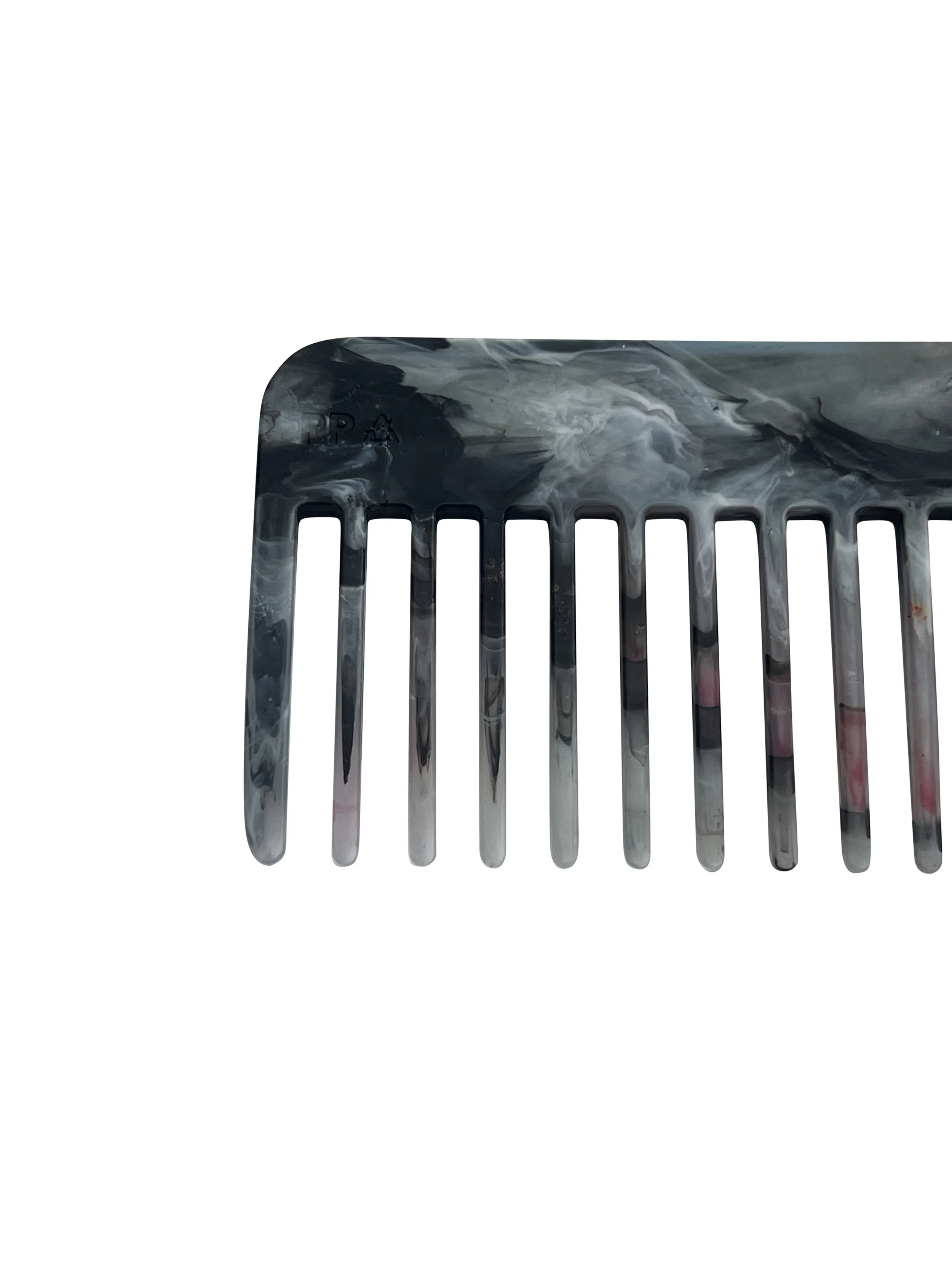 Hair combs made from recycled plastic — Re=Comb