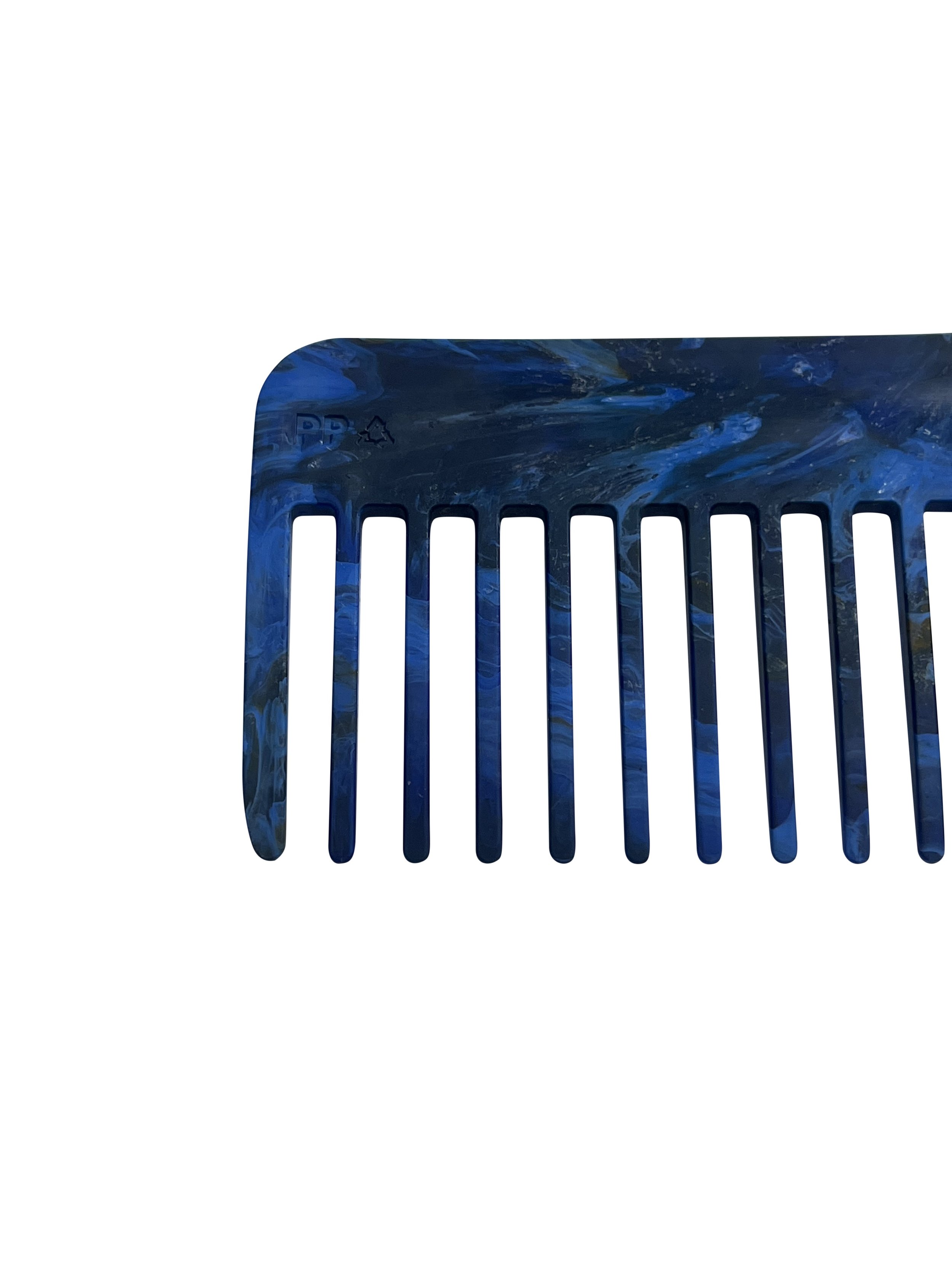 Hair combs made from recycled plastic — Re=Comb