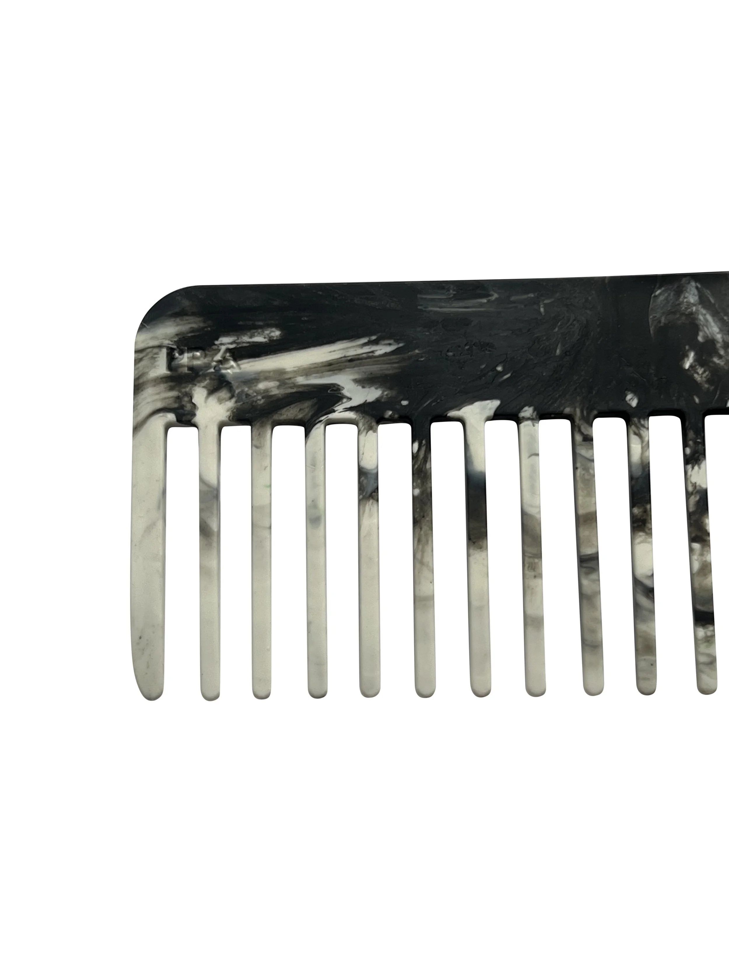 Hair combs made from recycled plastic — Re=Comb