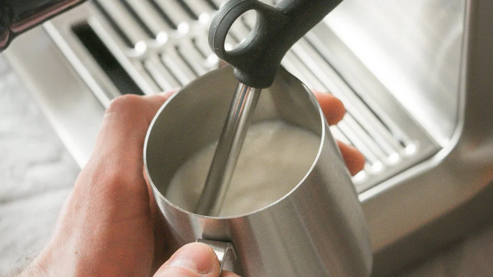 How to steam milk on the Breville / Sage Barista Express — Brewing With ...