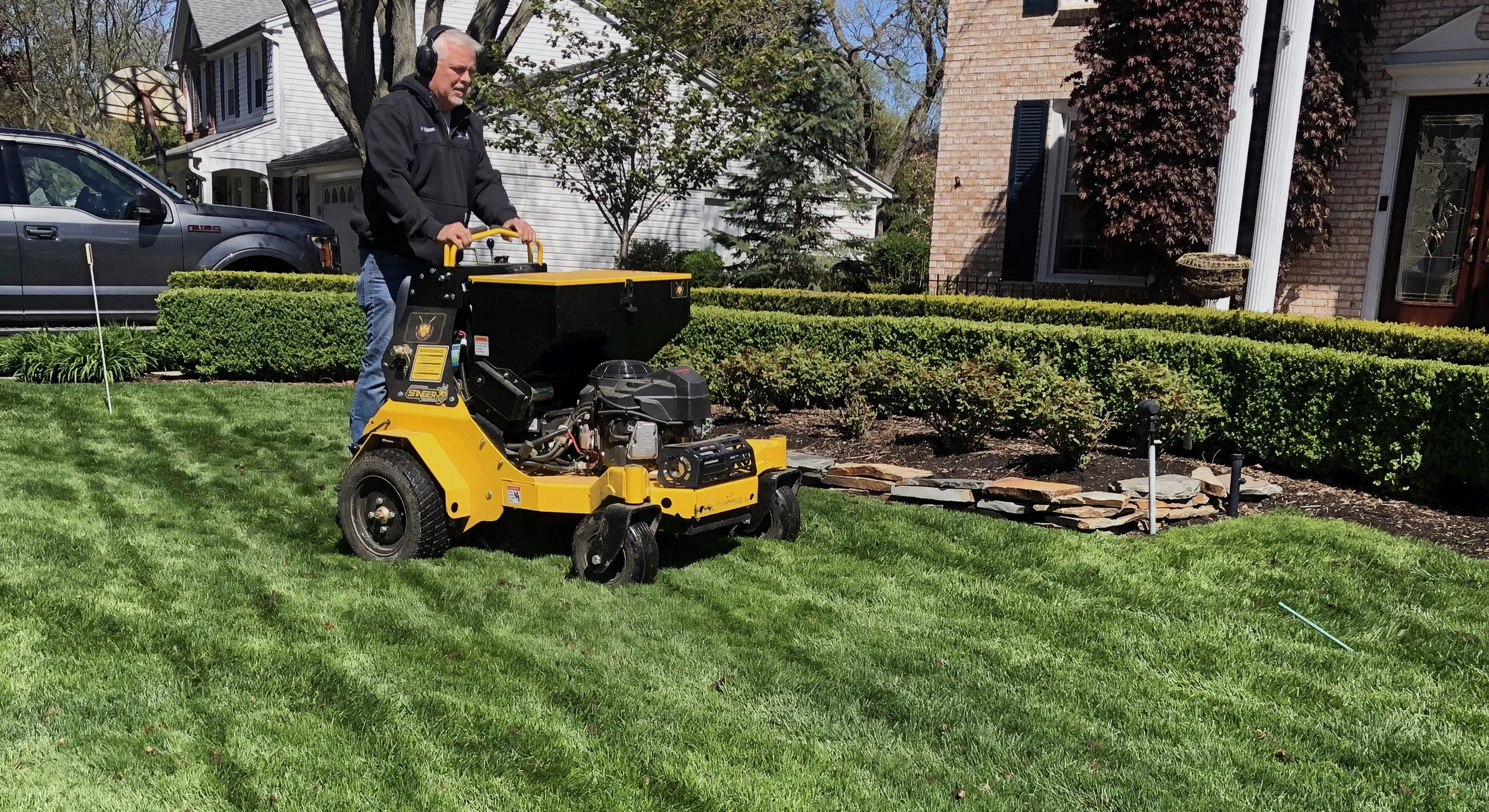 Orchard Lawn Aeration & Fertilization
