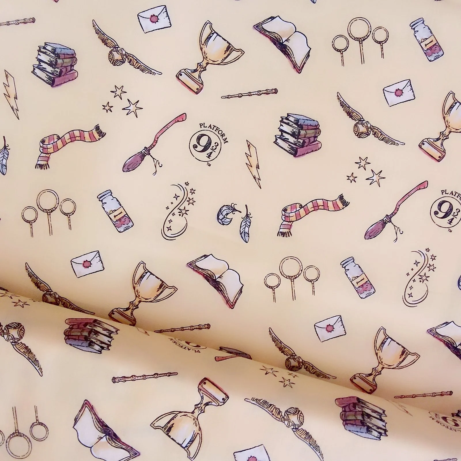 Harry Potter Golden Snitch Hogwarts Crests Fabric per 50cm Crafty Baba ...