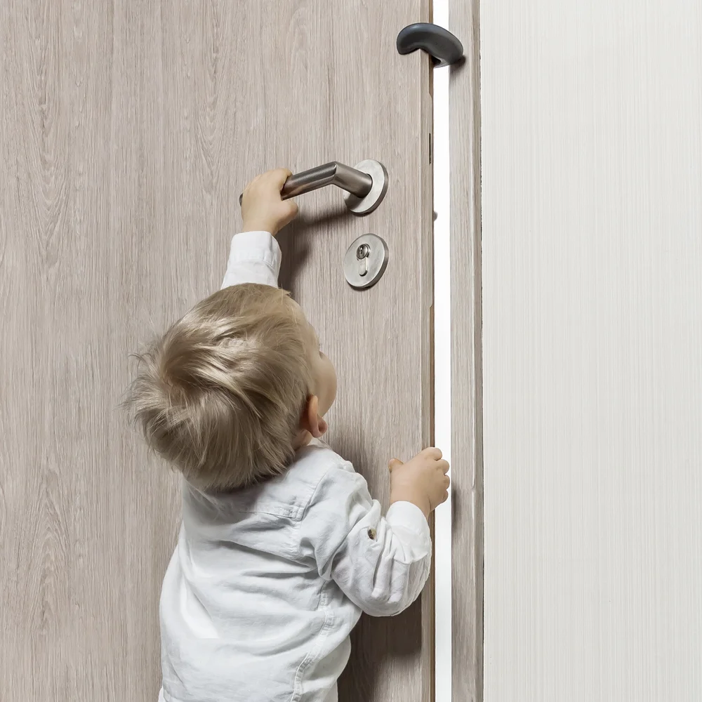 Child Opening Door