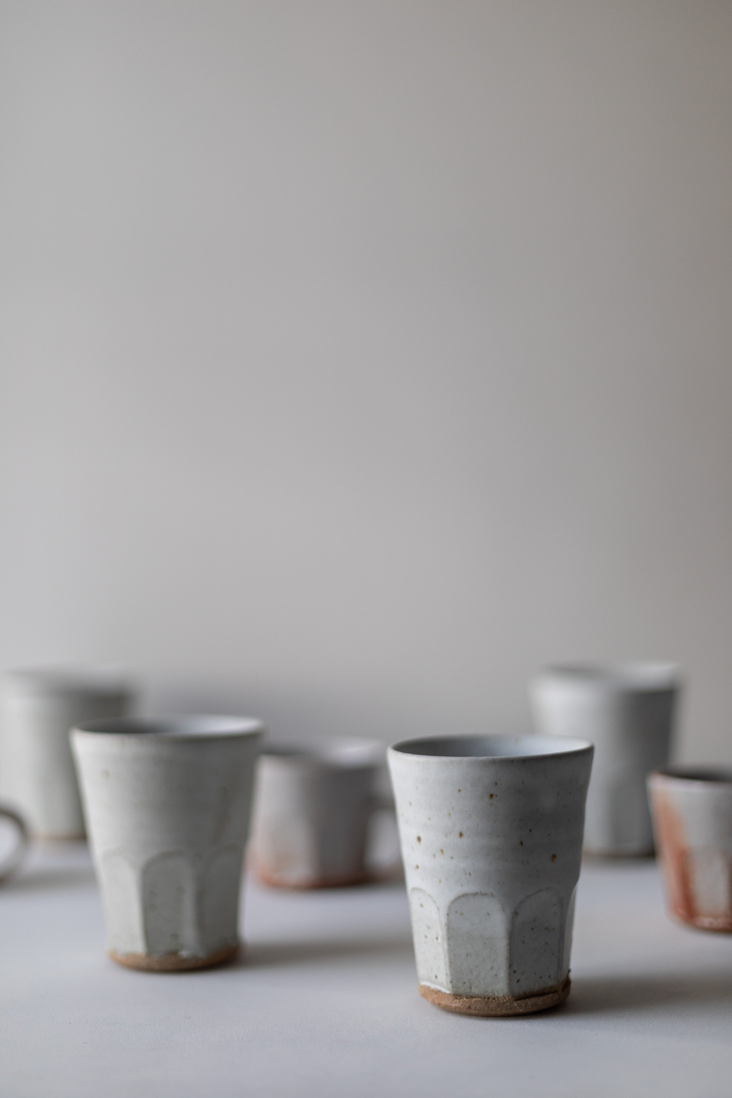 Shino Faceted Mugs by Tim Lake — | Flow Gallery