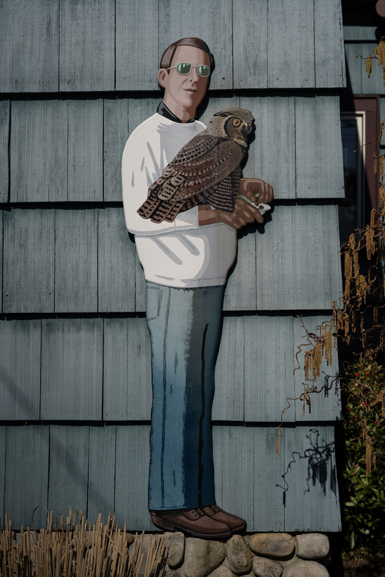 Phillip McCracken and owl. — Bill Mitchell Mural Project