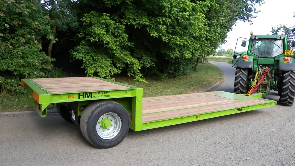 IMPLEMENT — HM Trailers