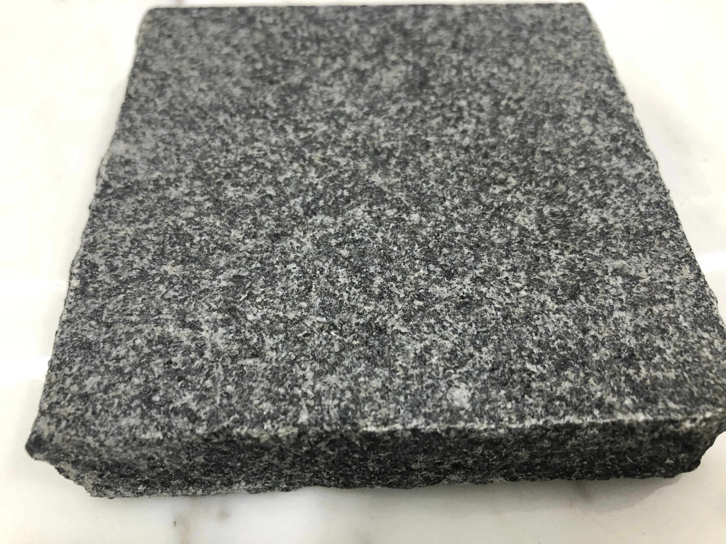 Raven Granite Cobble - Stone Collective