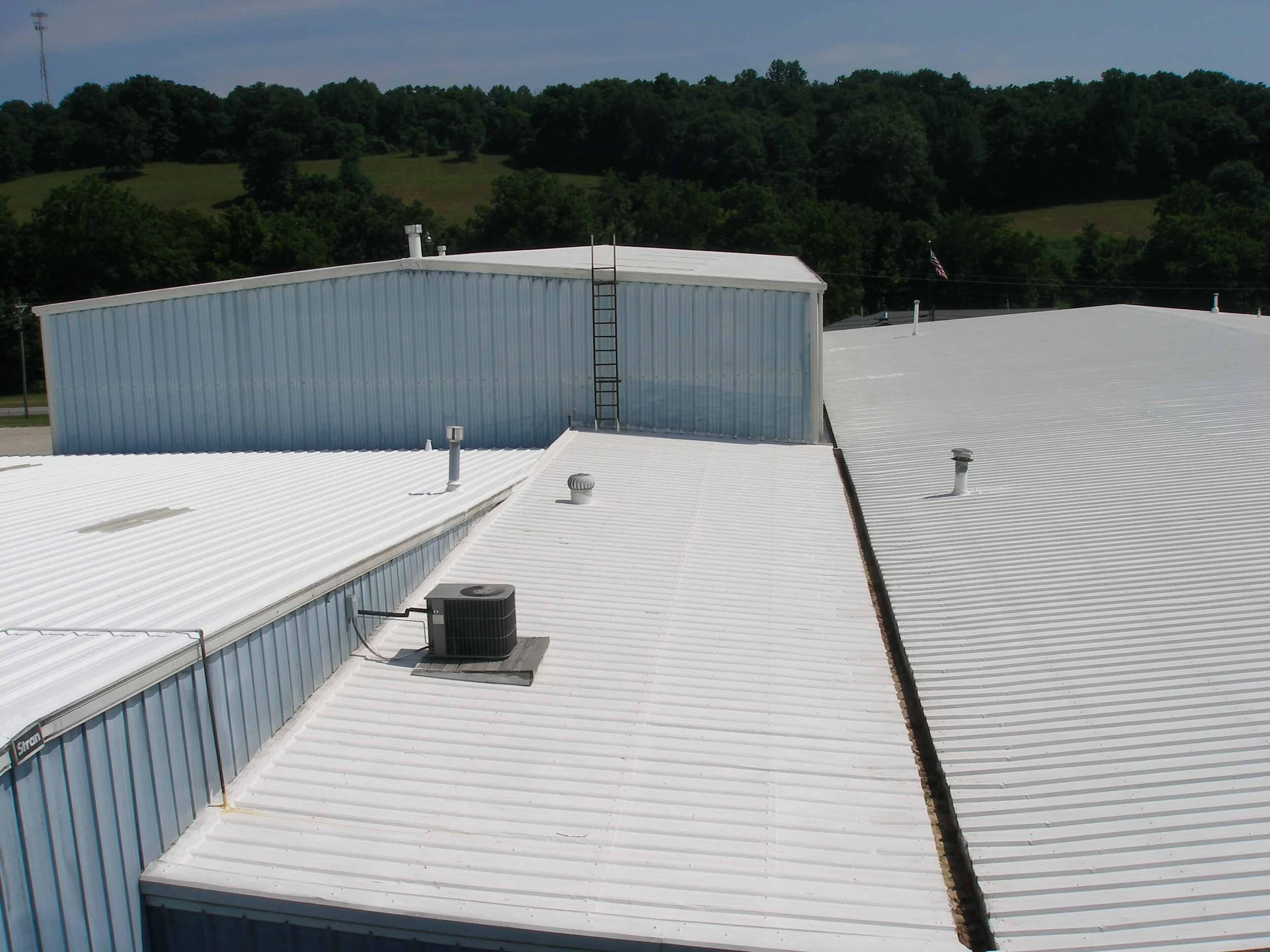 Premium Coating Systems for Flat and Metal Roofs — Rich Roofing Systems ...