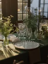 An intimate dinner with abundant candlelight & monochromatic ...