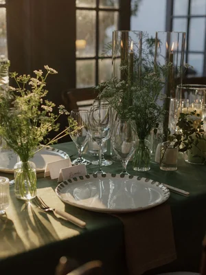 An intimate dinner with abundant candlelight & monochromatic ...