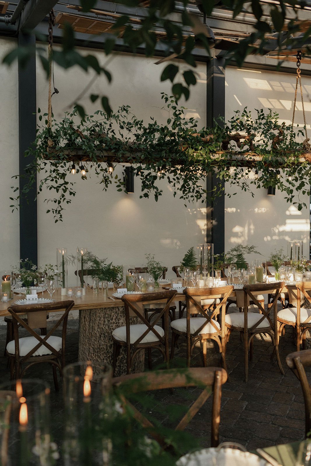 An intimate dinner with abundant candlelight & monochromatic ...