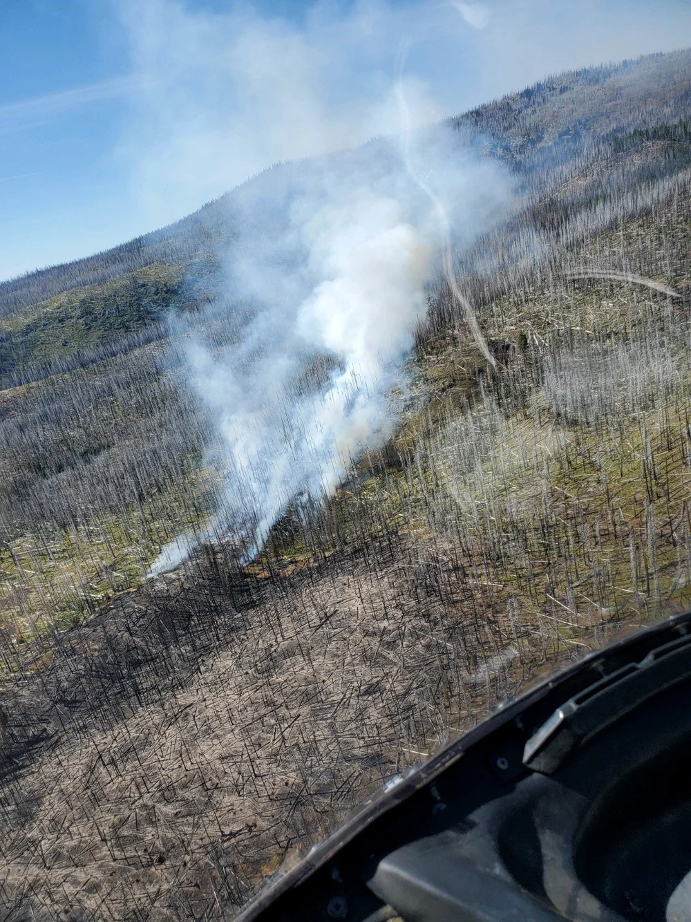 Warmer temps spur burn inside containment lines of Williams Mine Fire ...