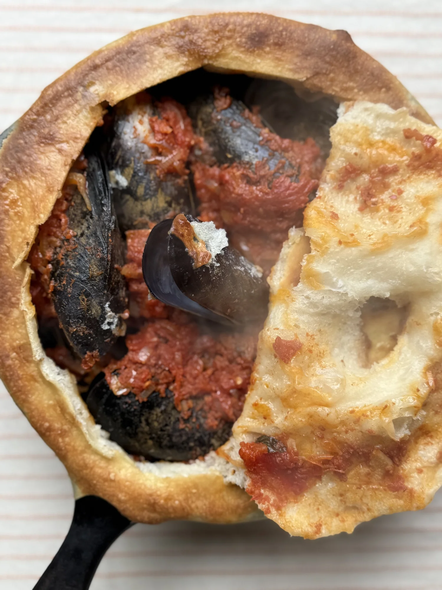 Nduja mussels baked in pizza dough — Danielle Alvarez