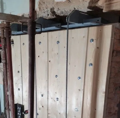Repair or retrofit masonry walls using CLT panels — PYTHON Fixings AU