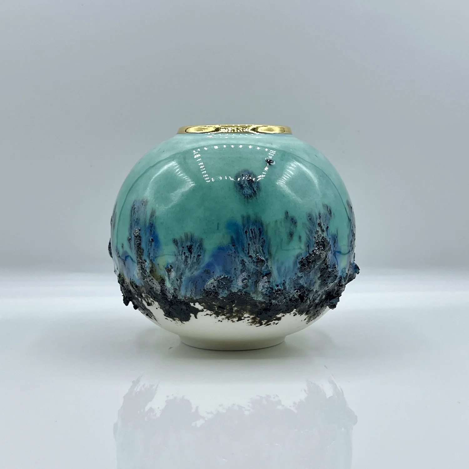 Mottled blue and black clay inlaid Sea Globe (Platinum) — Blackbird ...