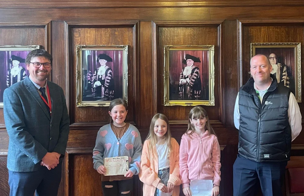 Three pupils from Bricknell Primary School secure the return of their ...