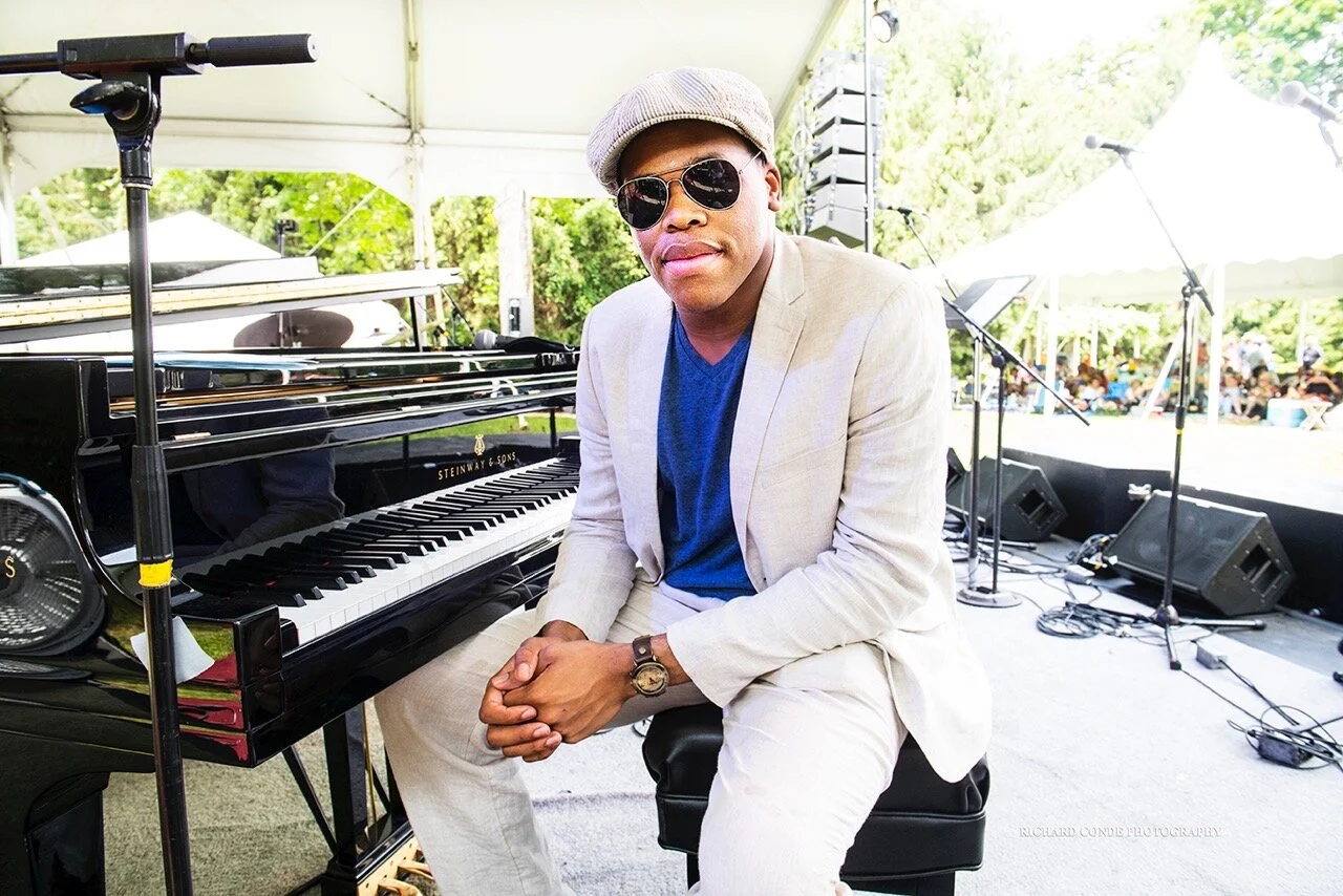 Biography — Isaiah J. Thompson