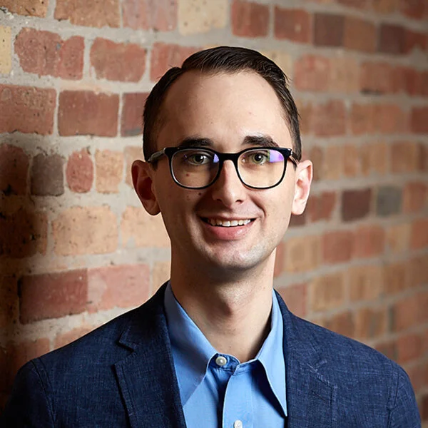 Spencer Asmann — Triton Capital Partners