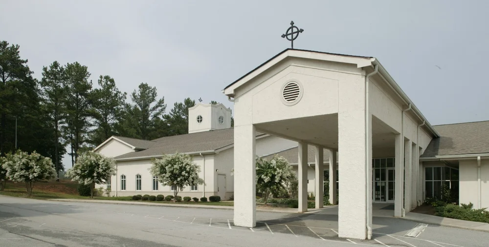 Our History — Holy Trinity Catholic Church