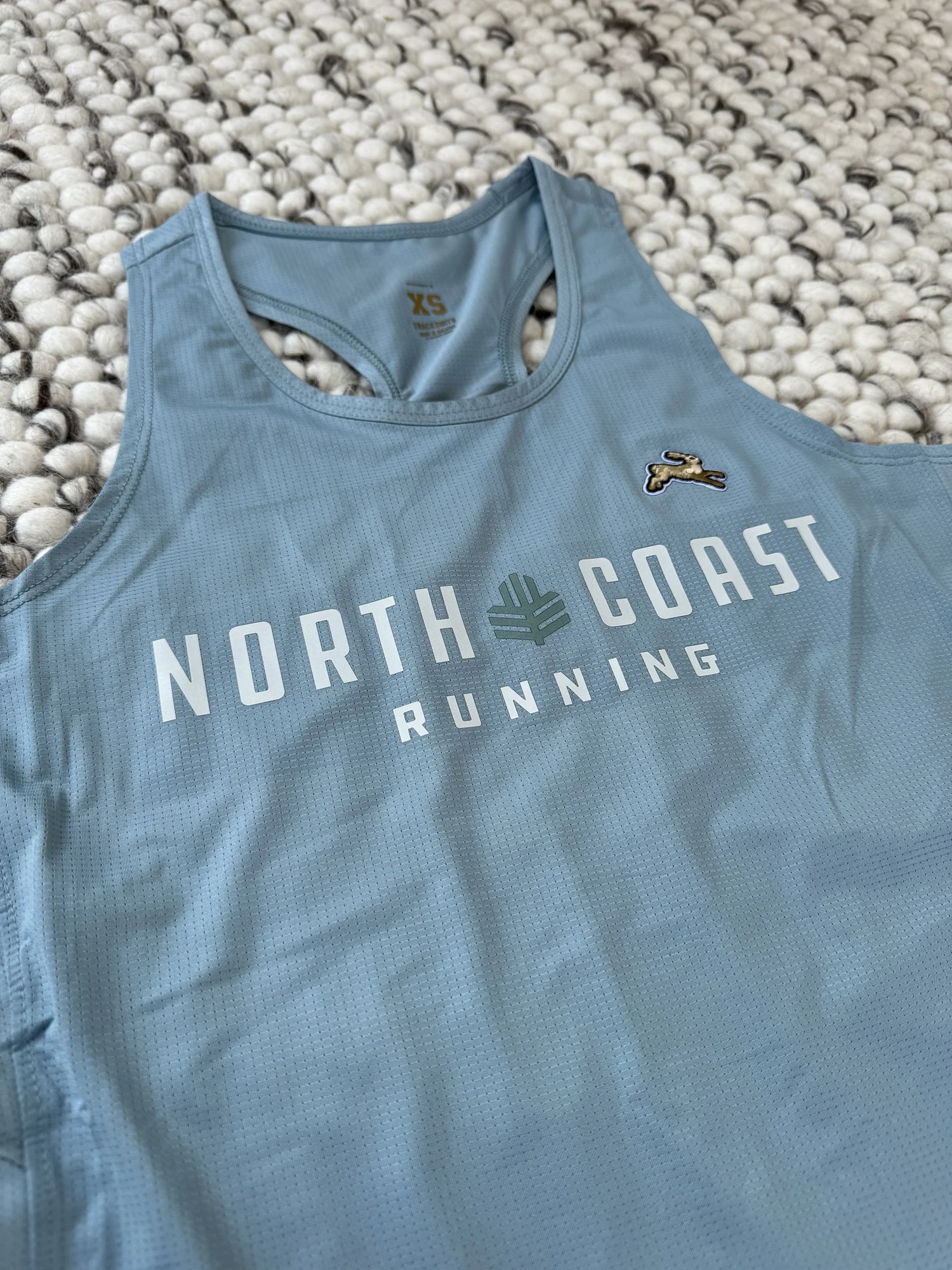 Women’s NCR Tracksmith Van Cortlandt Tank | Isle Royale Ivory — North ...