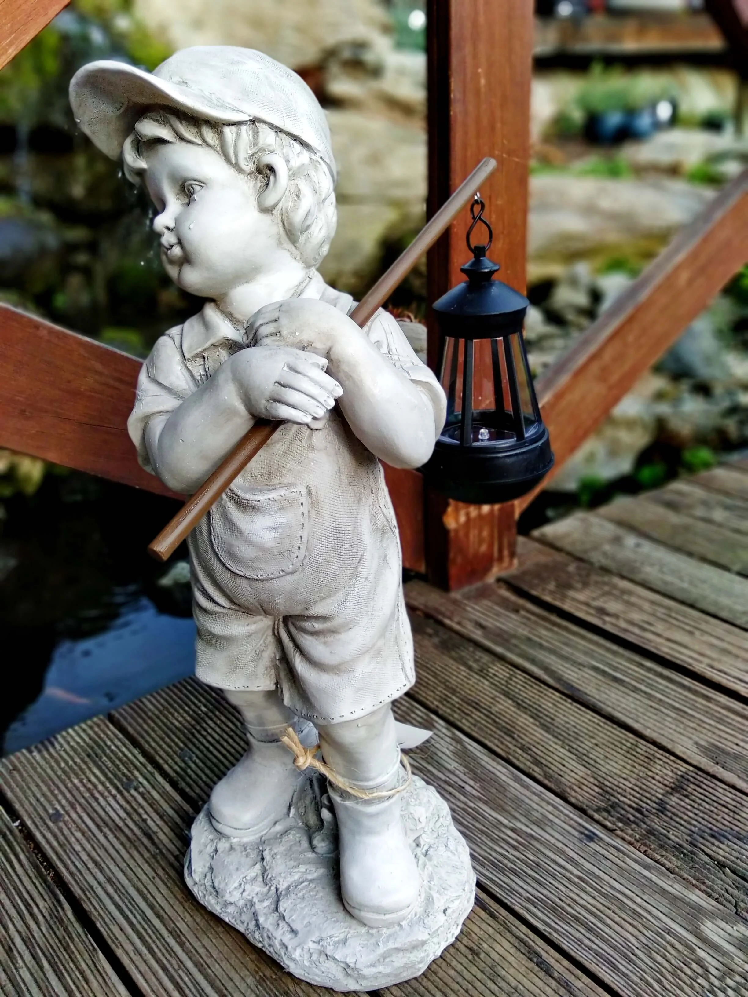 Solar Boy with Lantern — Mosgiel Garden Place