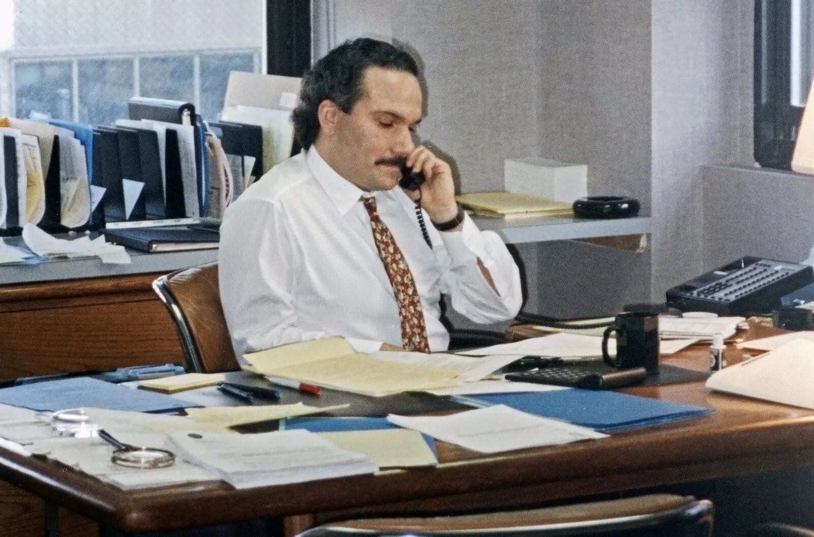 History — Ted Moudis Associates