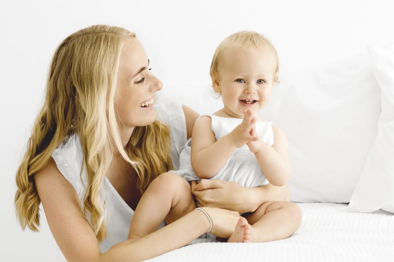 A baby photographed as a newborn and again at their 1st birthday. Lots ...