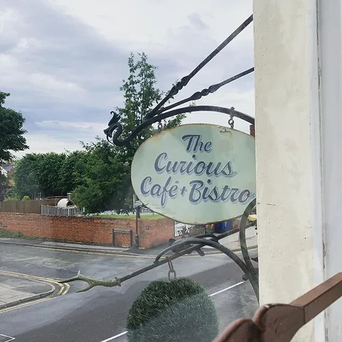 Our Story — The Curious Cafe and Bistro