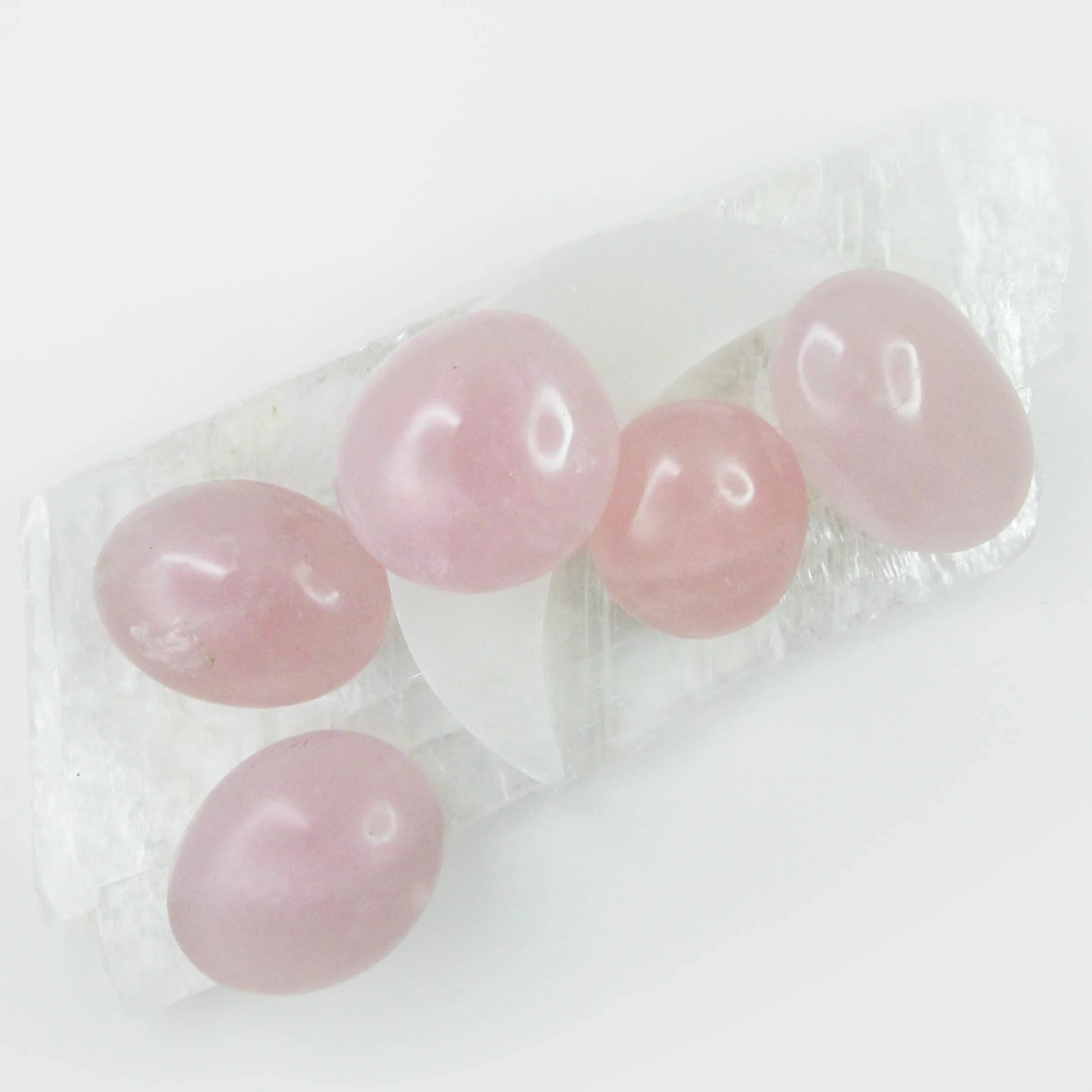 Rose Quartz Palm Stone | Attract Love — Ivy+Light