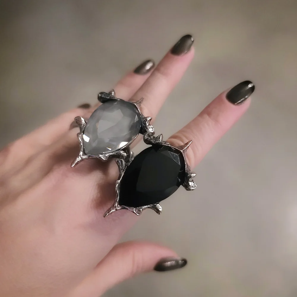 Harpy Eagle Claw Necklace with black glass. | Martha Rotten