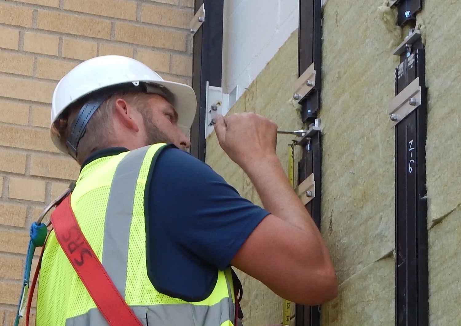 Tion T Hanger for rainscreen facade panels — TiOn Cladding Systems