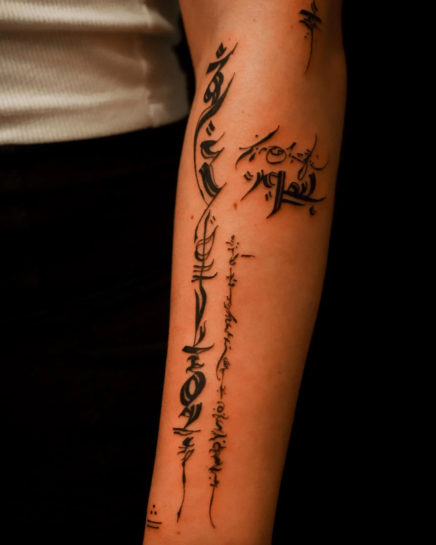 %TATTOO — EMERSON