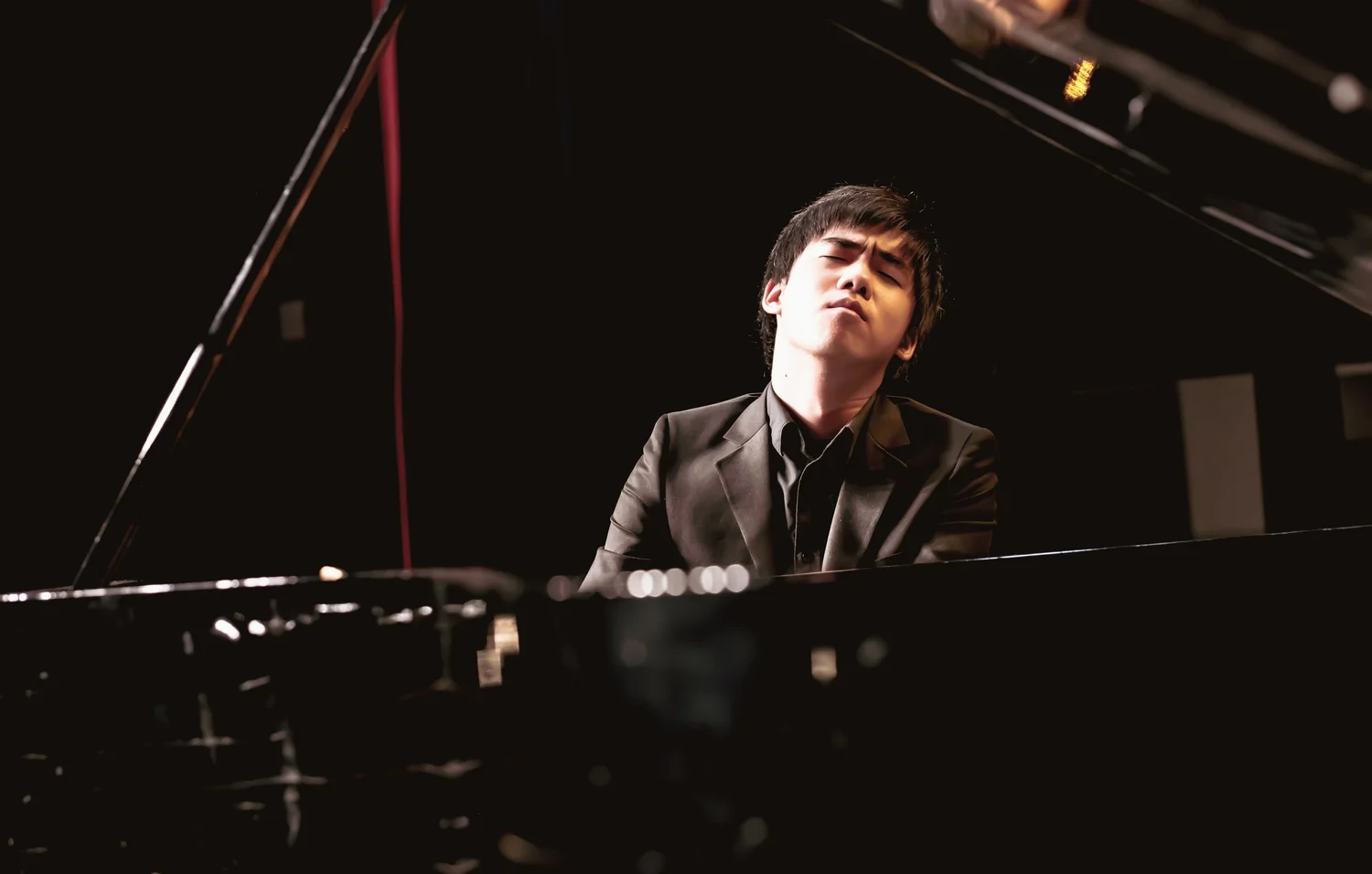 Nineteen-year-old Canadian pianist Kevin Chen balances works by his ...