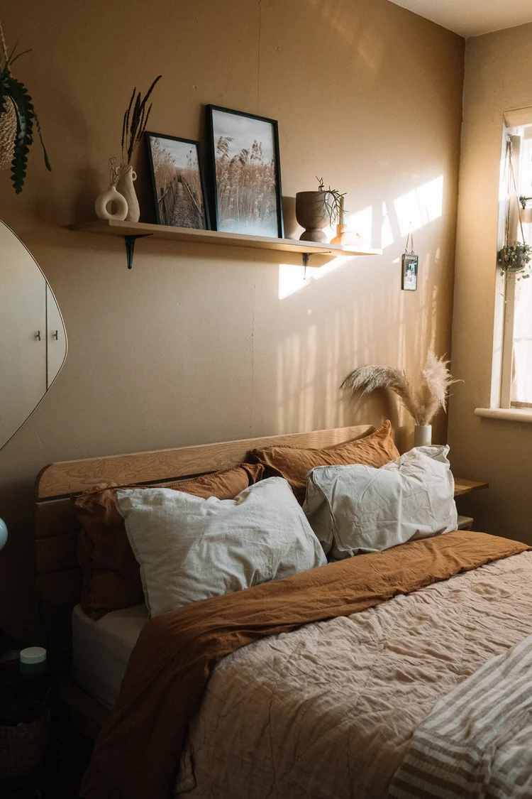 A rust and beige south facing bedroom makeover using Fired Clay by ...