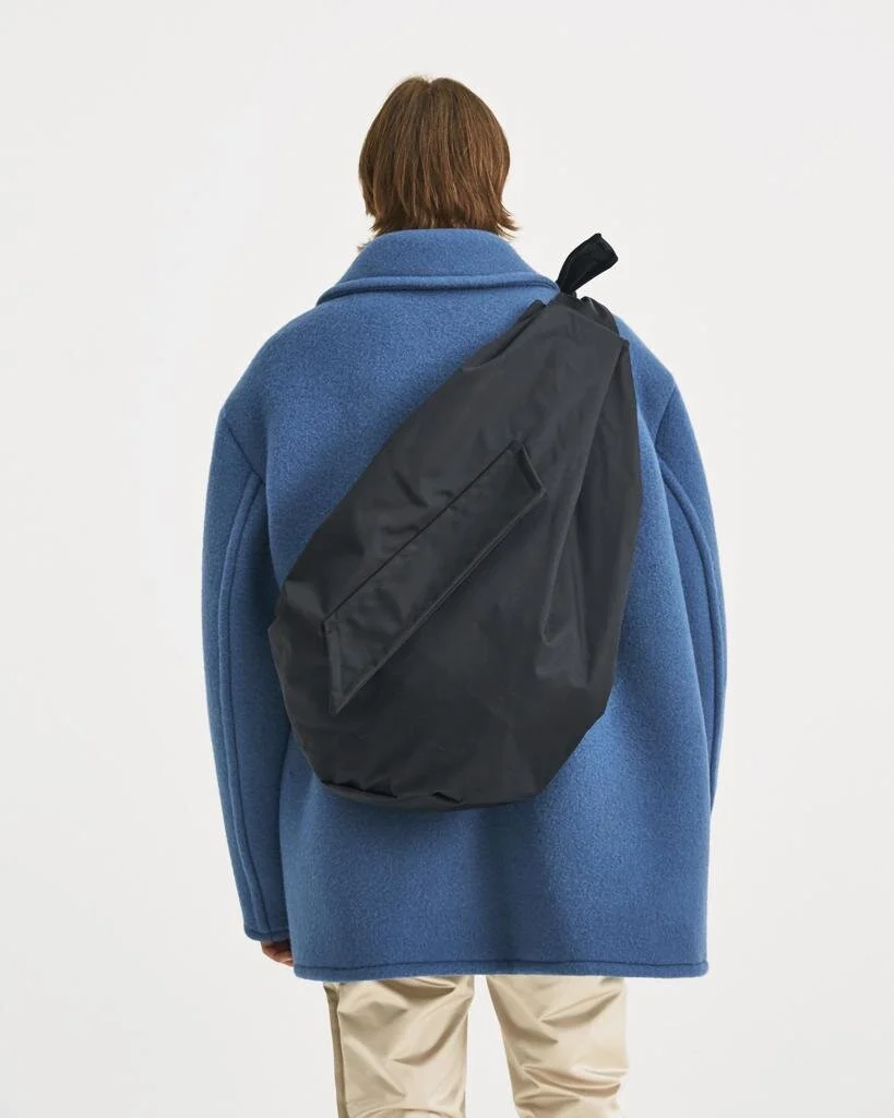 Eastpak x Raf Simons Sleek Sling Backpack — CONSUMED Eastpak x Raf Simons Sleek Sling Backpack — CONSUMED