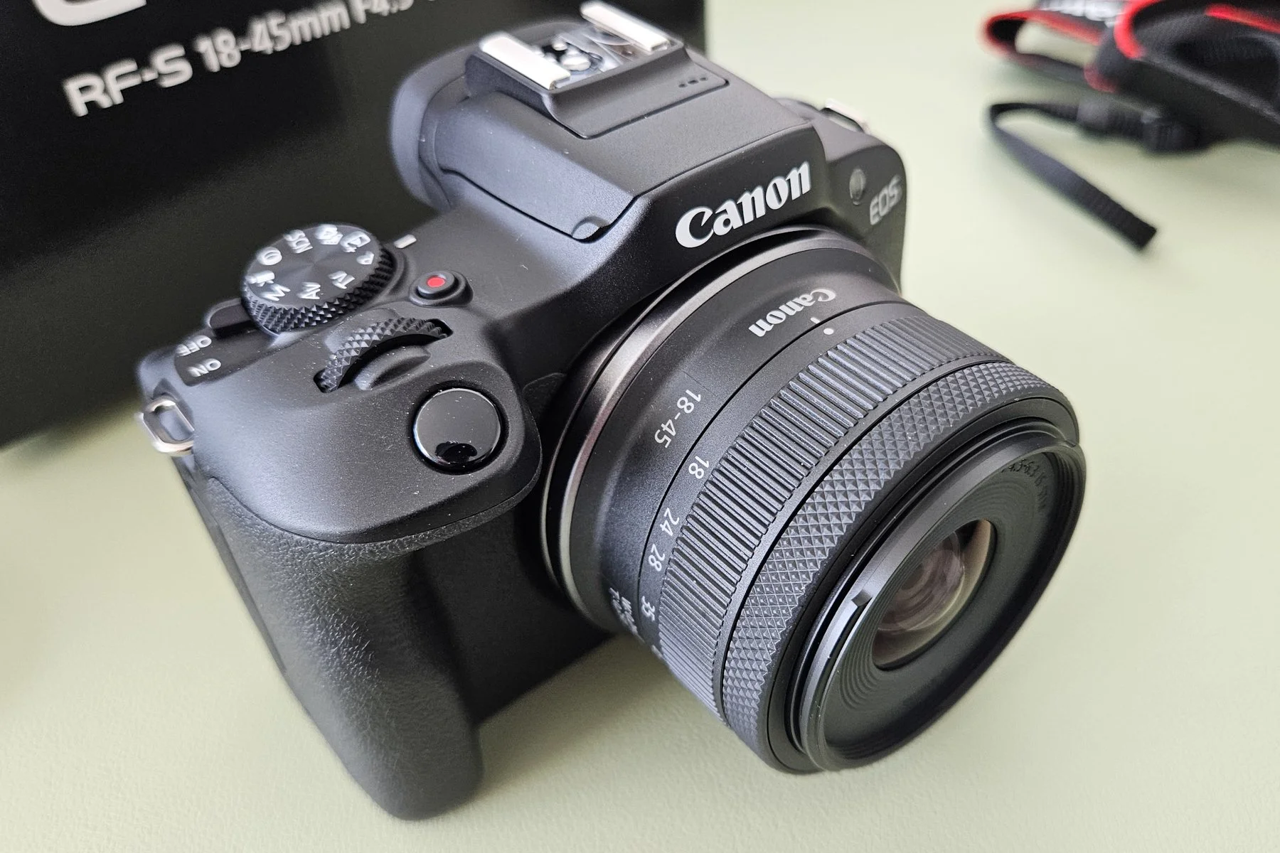 Canon EOS Rebel T7 vs. Canon EOS R100: Best Beginner Camera in 2025 ...