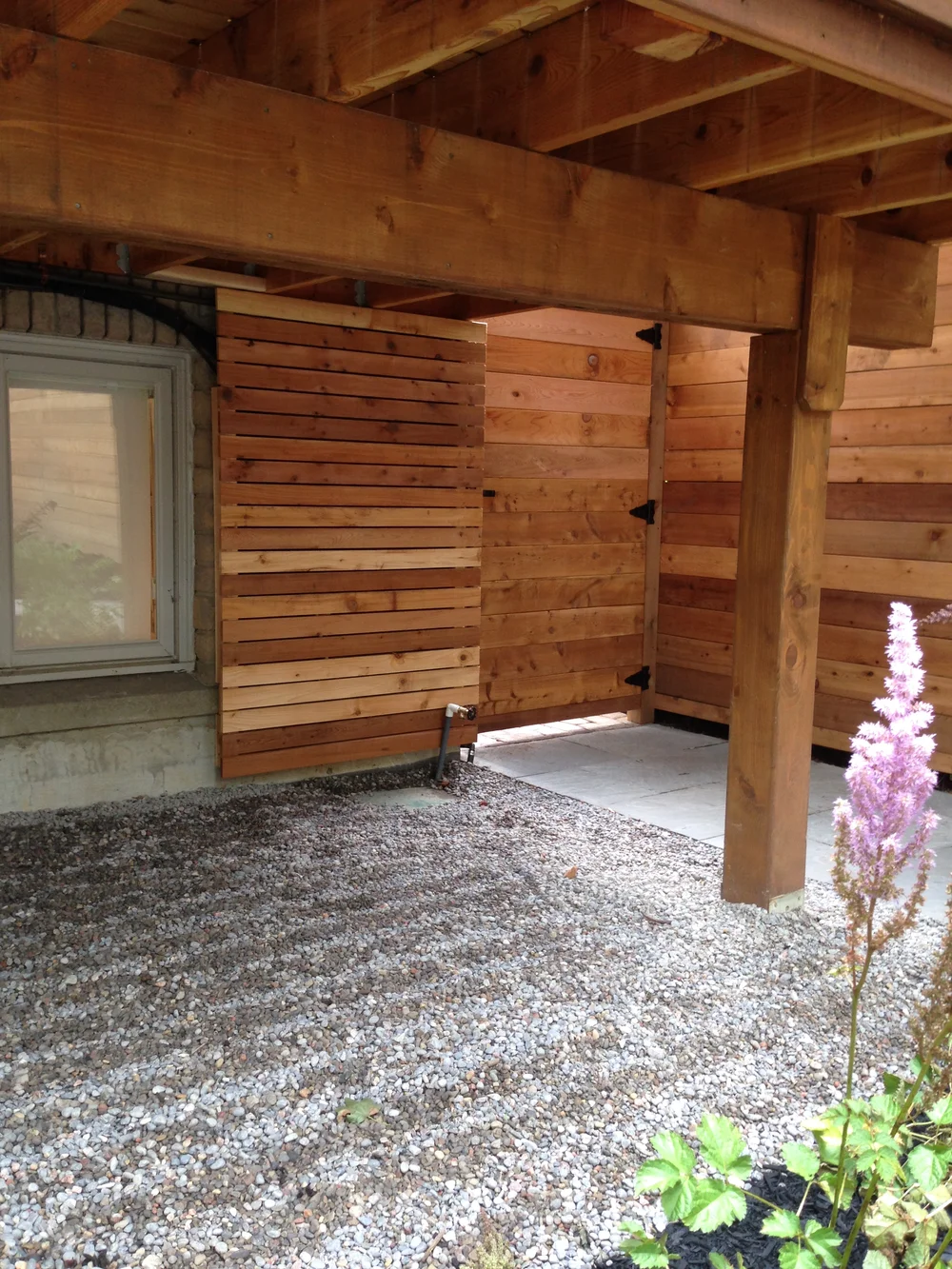 Beautiful facelift for a basement walkout — bsq Landscape Architects