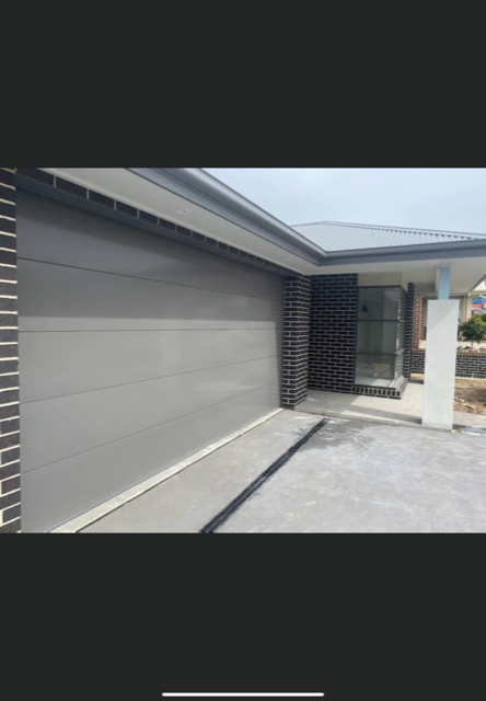Panel Lift Doors Sydney | Colorbond & Remote Controlled Garage Doors ...