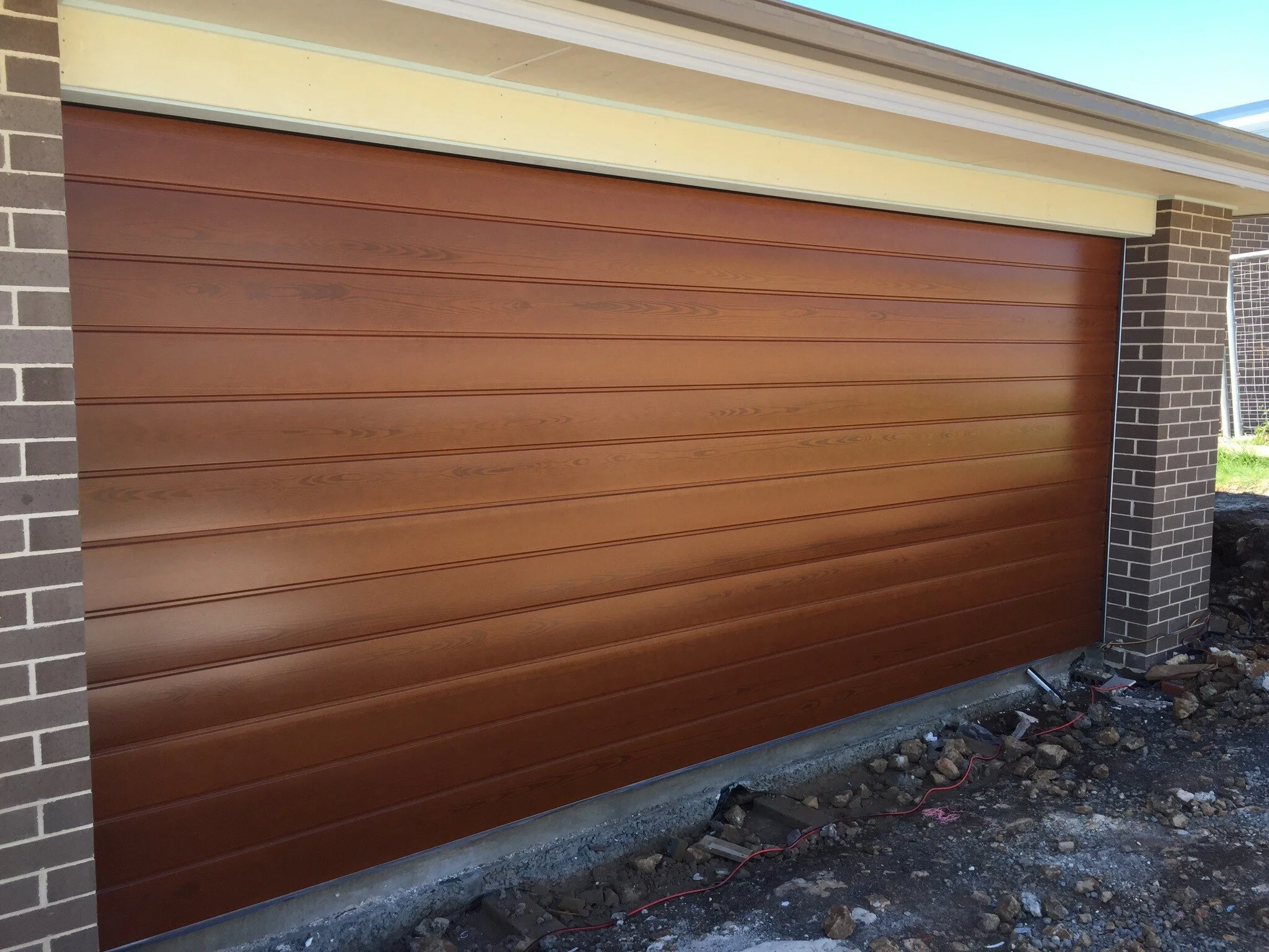 Timber Garage Doors Sydney | Timber Look Panel Lift Doors — Garage ...