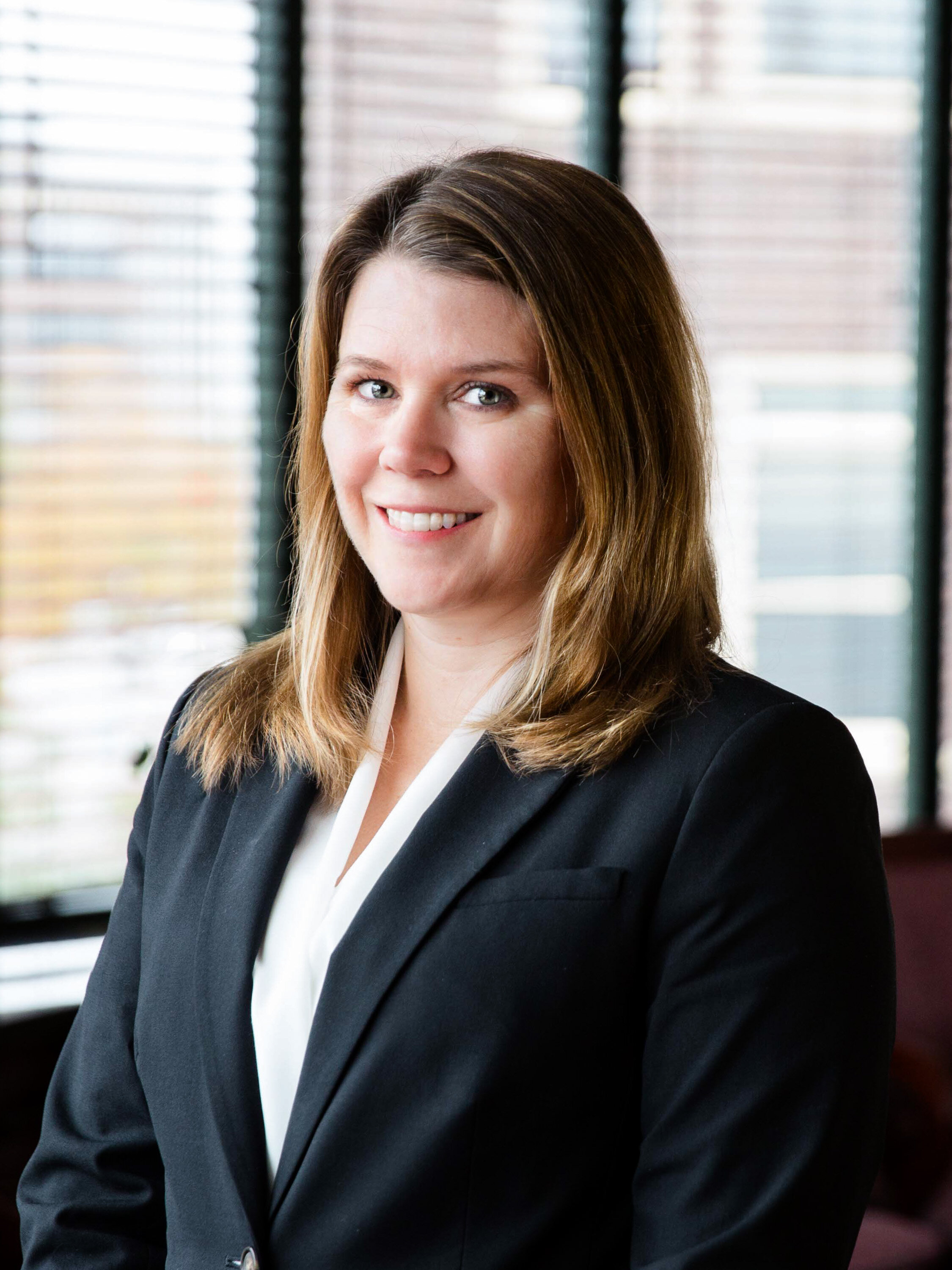 Elizabeth A. Lewis: Real Estate & Finance Law — Woods Fuller