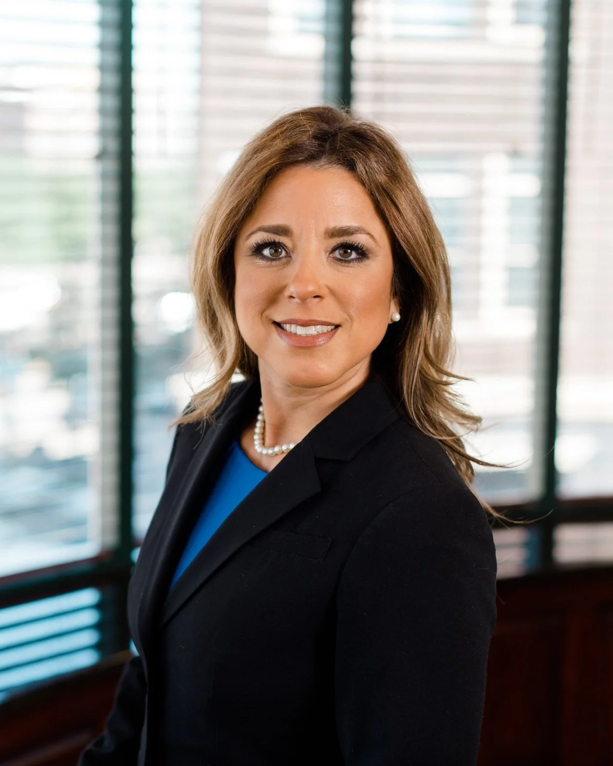 Jennifer L. Wosje: Work Compensation & Litigation Expert — Woods Fuller