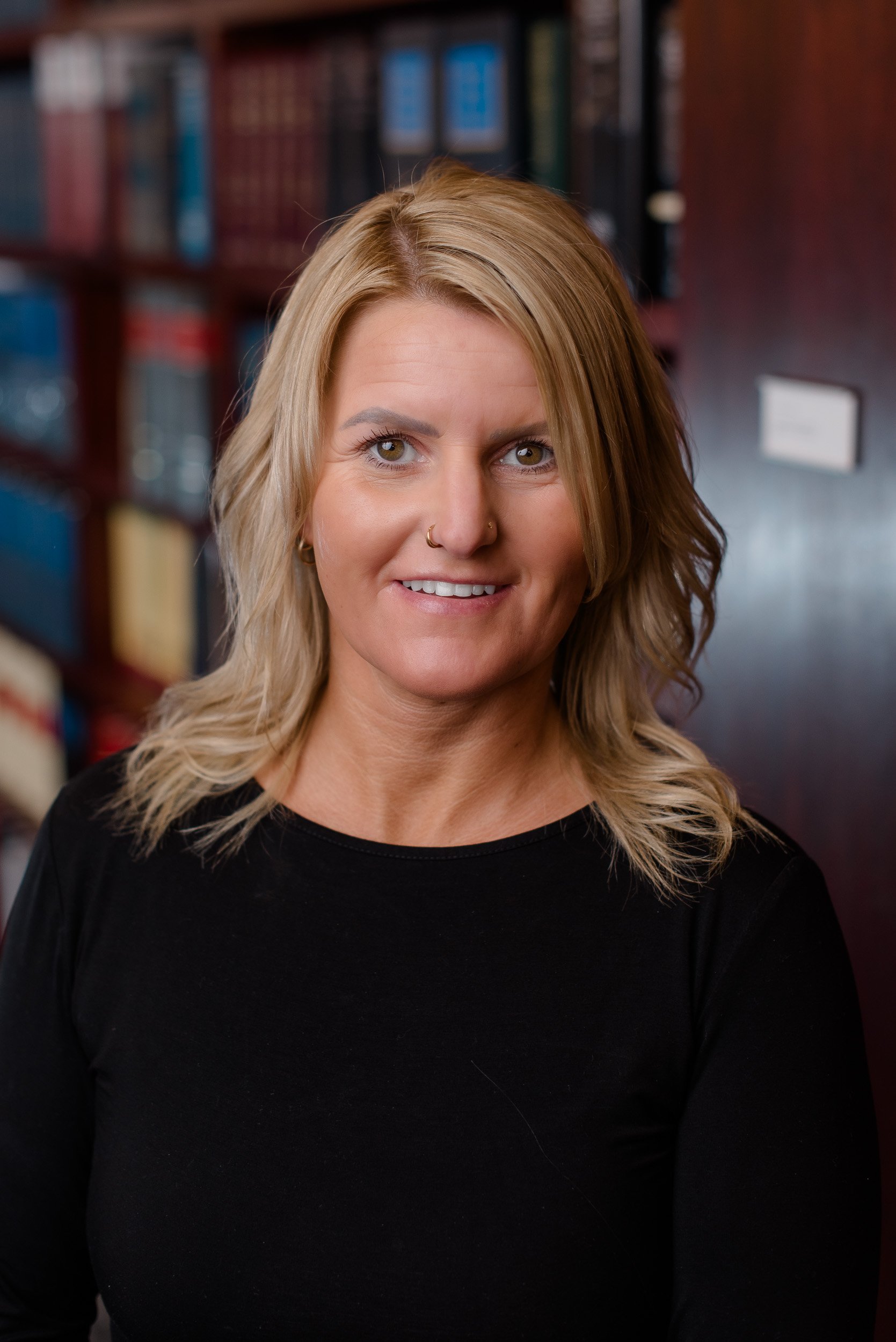 Tiffany Larson | Paralegal — Woods Fuller