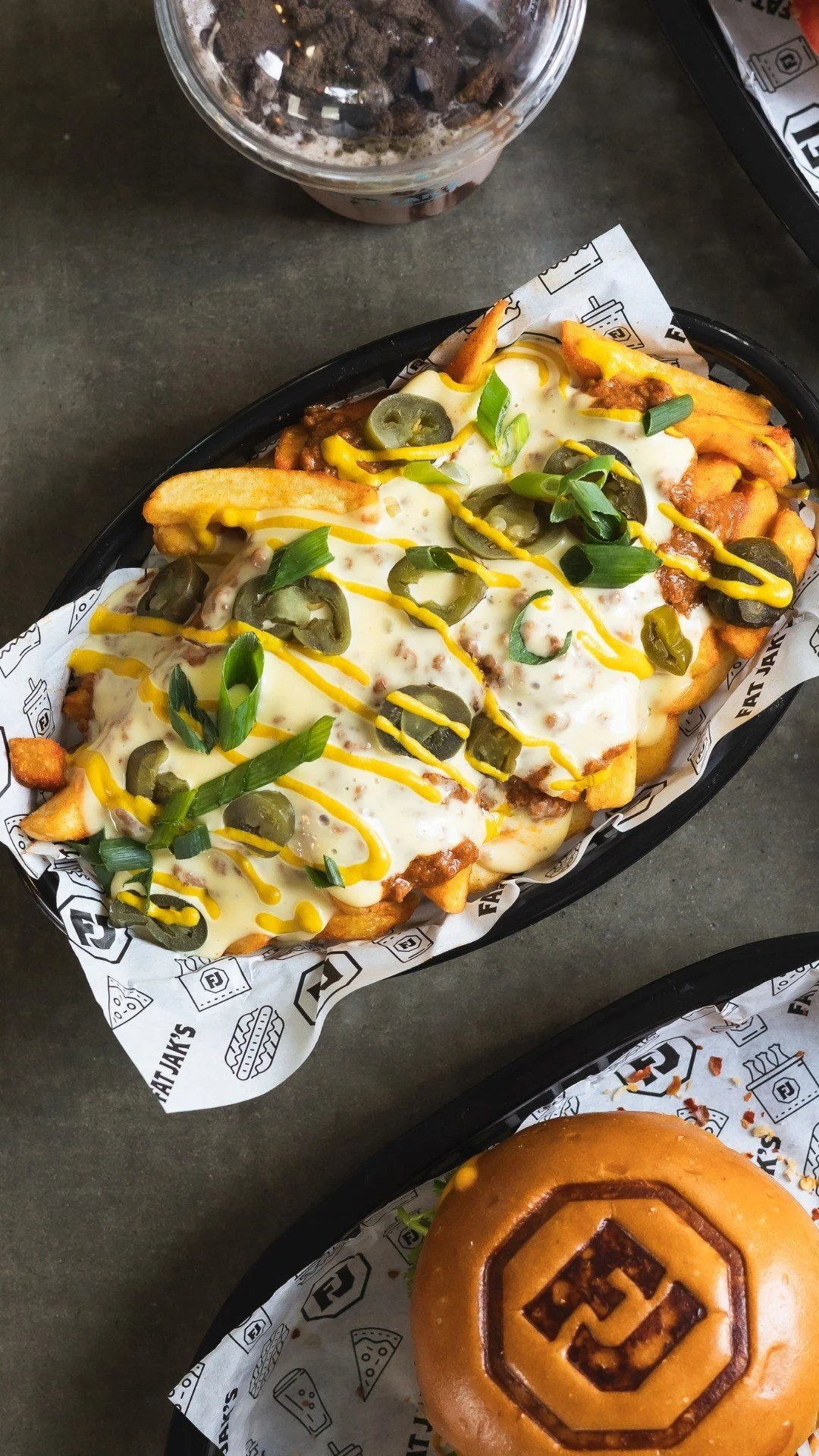 FAT JAKS Restaurant - Burgers - Parmas - Loaded Fried | Melbourne