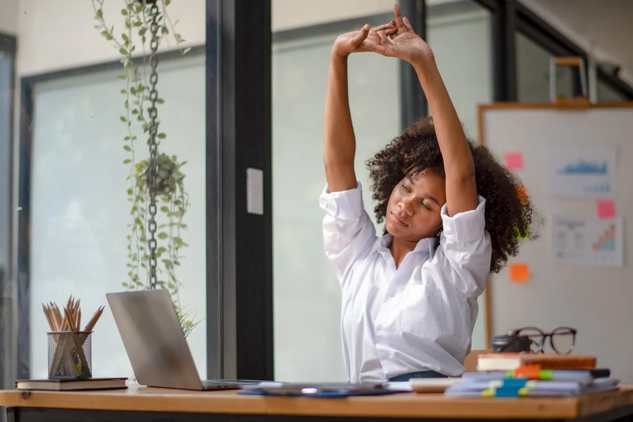 Desk Yoga: 7 Stretches to Relieve Work-Related Tension — Whole Health ...